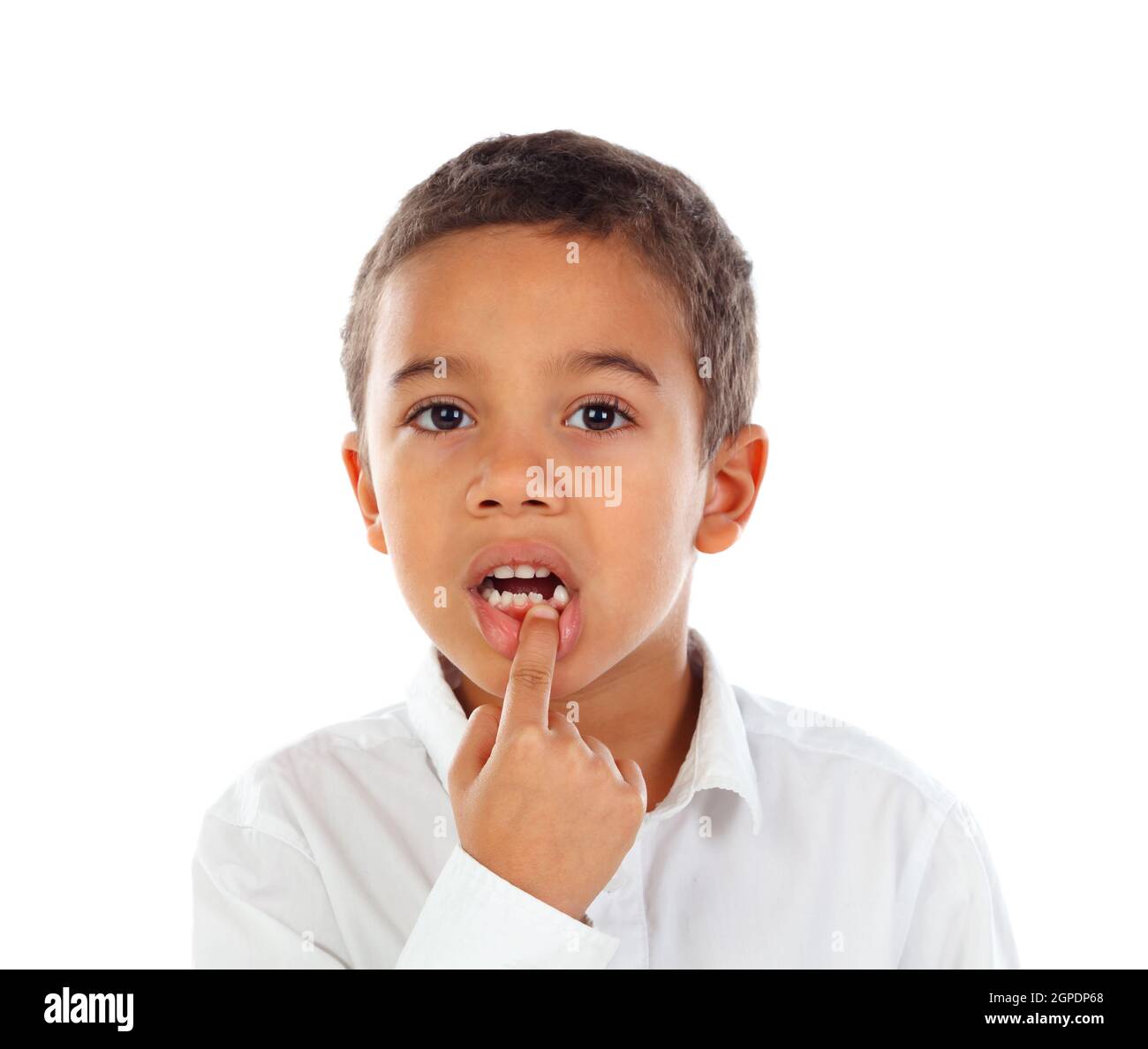 Latin child showing his new teeth isolated on a white background Stock ...