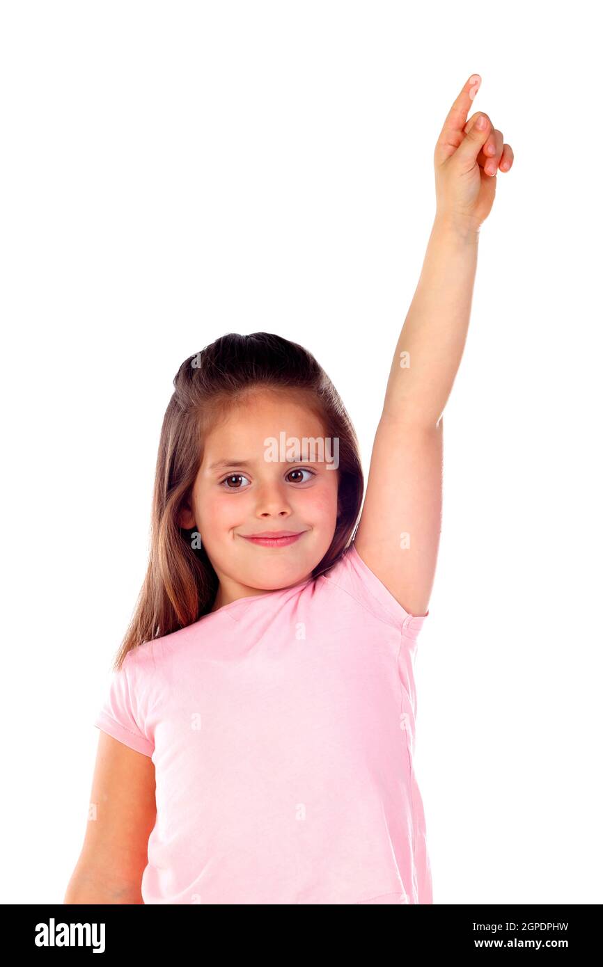 Cute child girl pointing with his finger isolated on white background ...