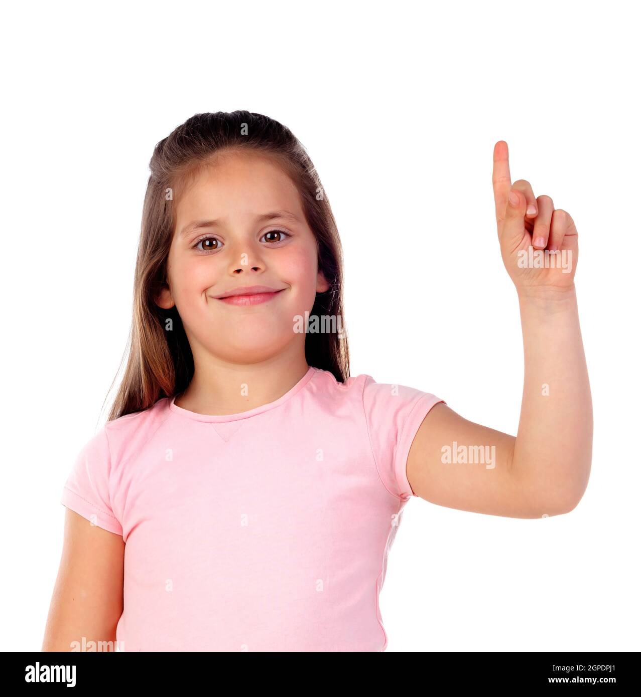 Cute child girl pointing with his finger isolated on white background ...