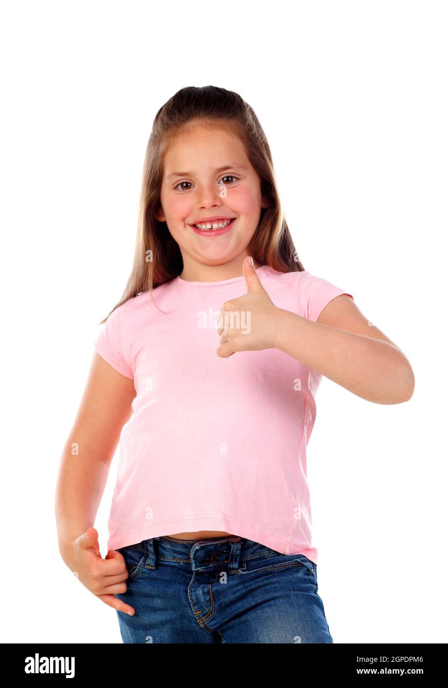 Friendly child saying Ok with her thumbs isolated on a white background ...