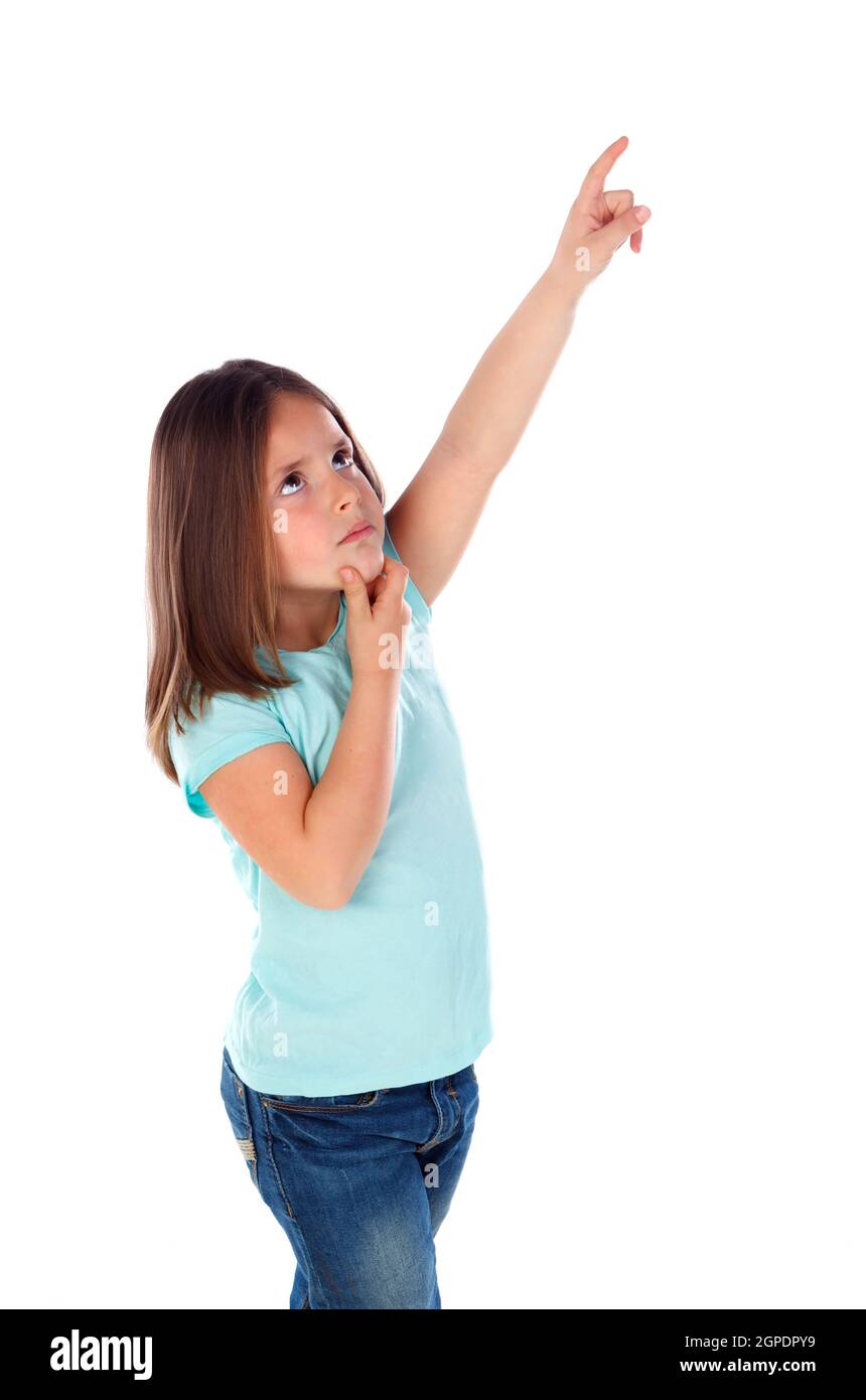 Cute child girl pointing with his finger isolated on white background ...