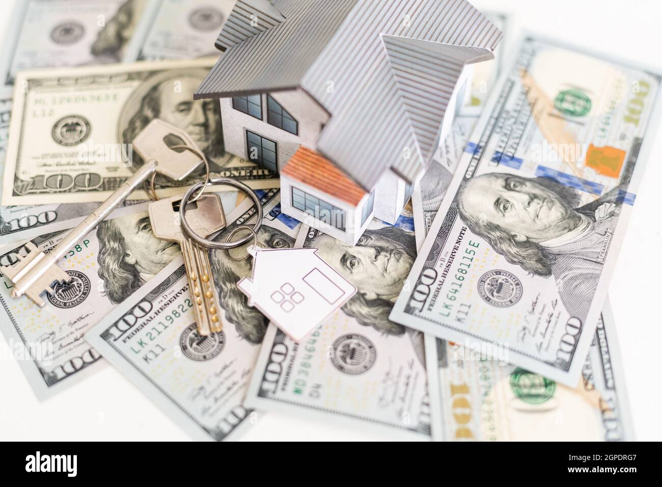 house layout and dollar bills on the background Stock Photo - Alamy