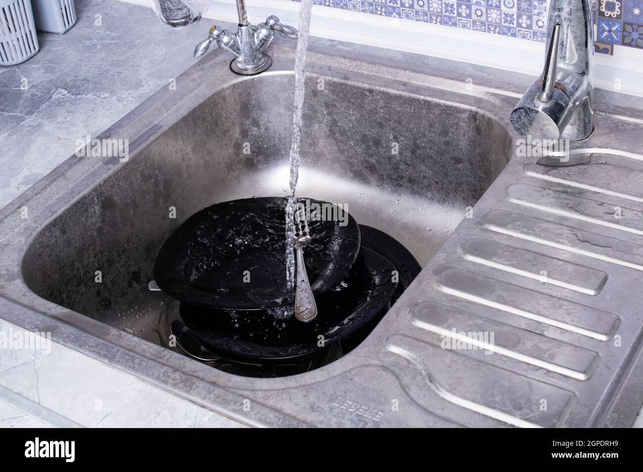 Water tap under counter hi-res stock photography and images - Alamy