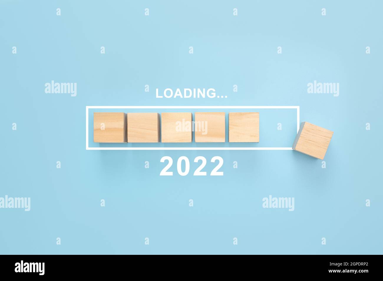 Business concept of planning 2022. Loading new year 2022 wood cube in ...