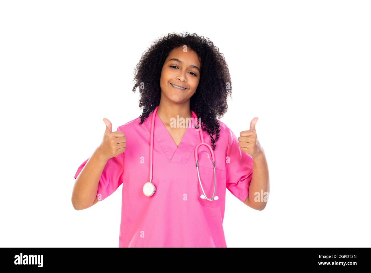 Adorable little doctor with pink uniform isolated on a white background ...