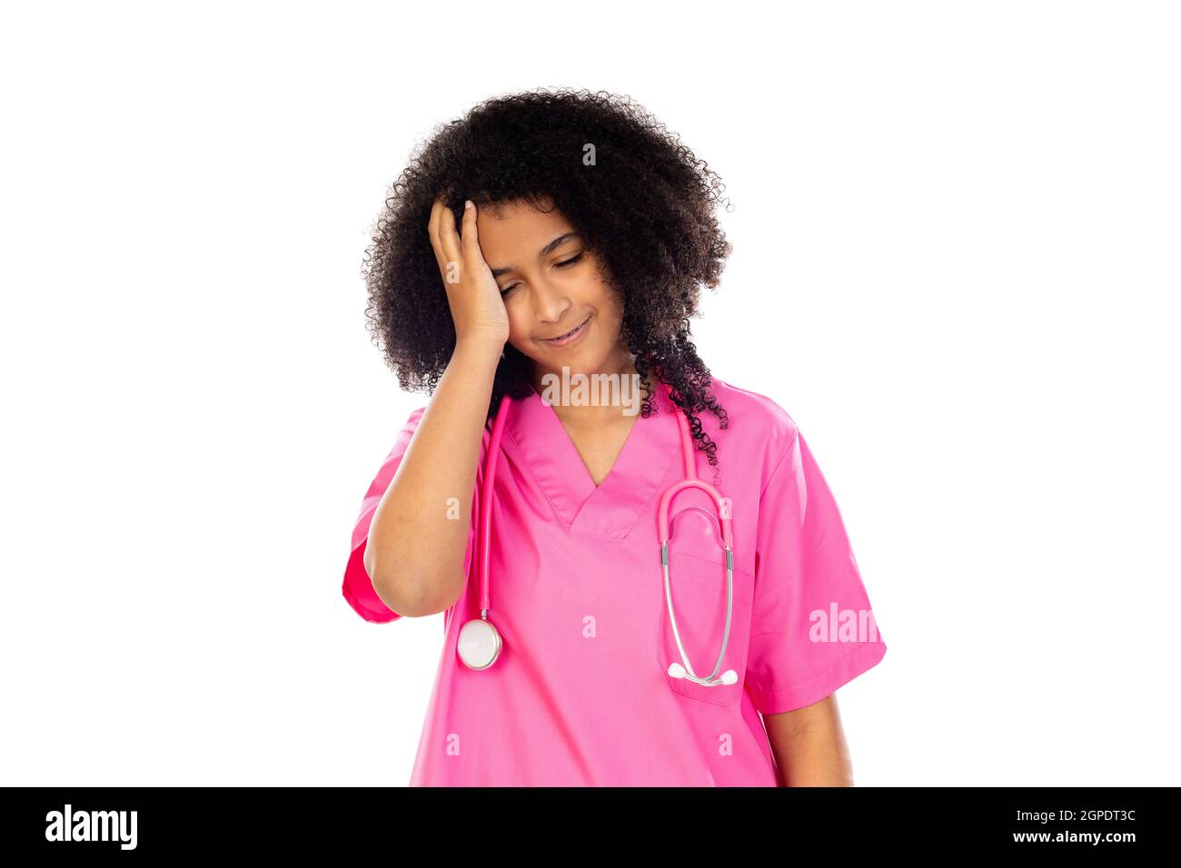 Adorable little doctor with pink uniform isolated on a white background ...