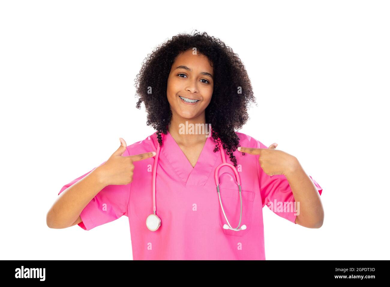 Adorable little doctor with pink uniform isolated on a white background ...