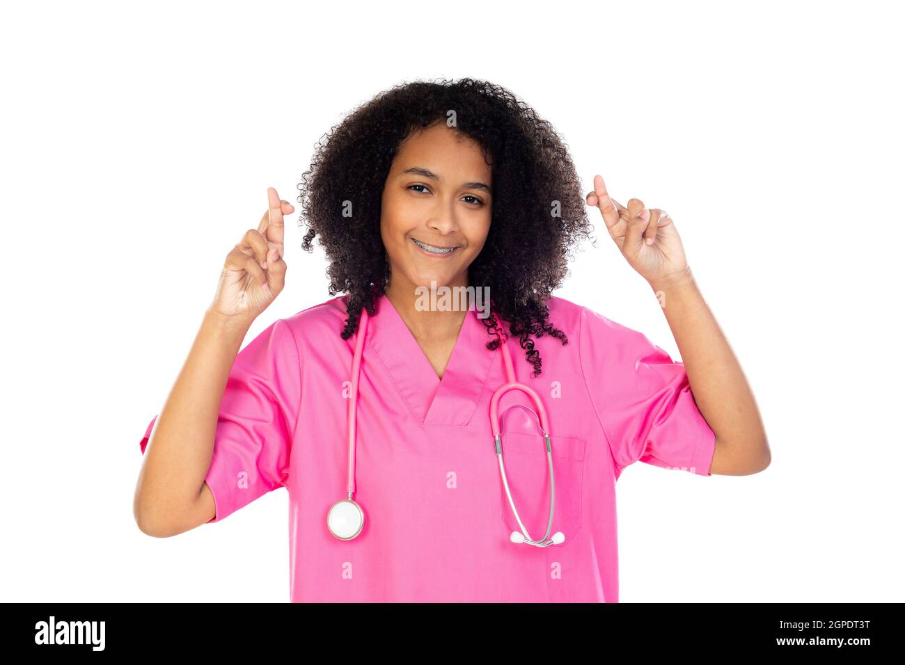 Adorable little doctor with pink uniform isolated on a white background ...
