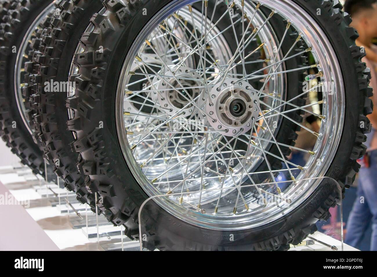 Closeup shot of motorcycle tires on display in Chinese international ...