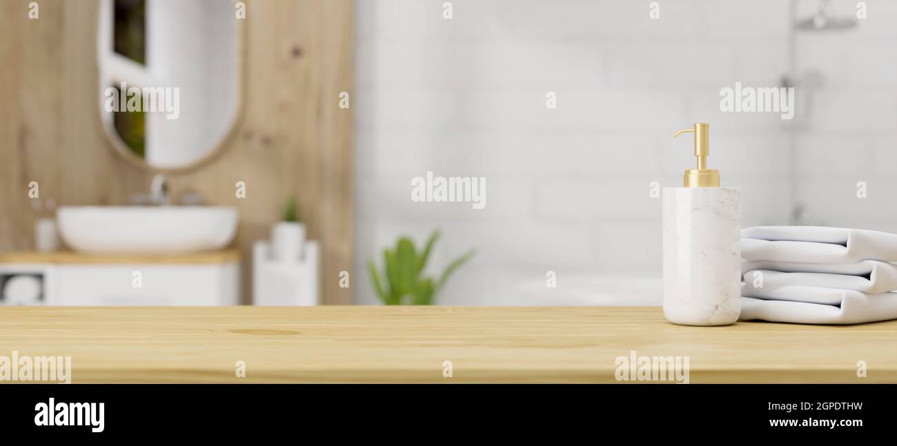 Wooden table top or wooden board with ceramic shampoo bottle and towels ...