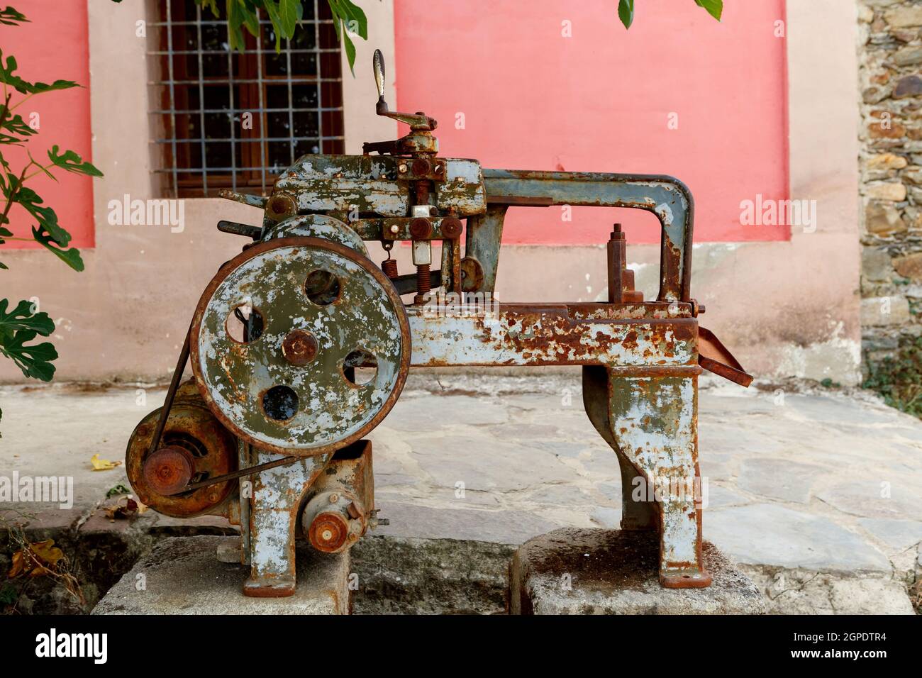 Old rusty machine located in a garden for exposition Stock Photo - Alamy