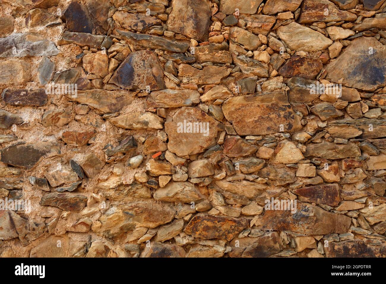 Red stone wall to use as wallpaper Stock Photo - Alamy