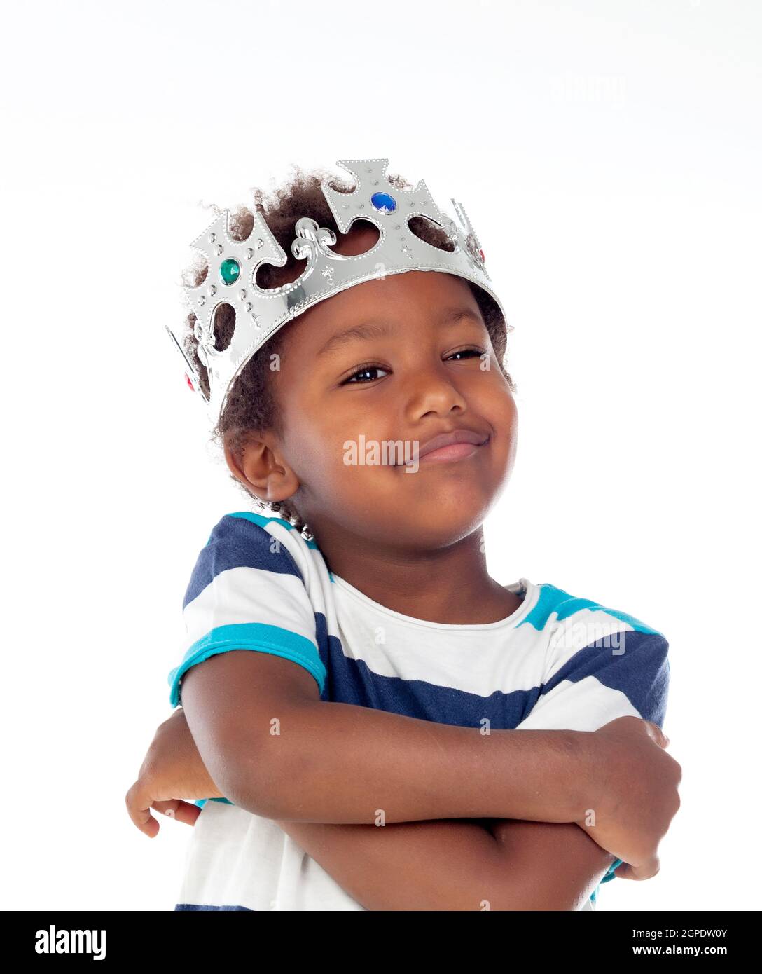 Happy african child with silvered crown isolated on a white background ...