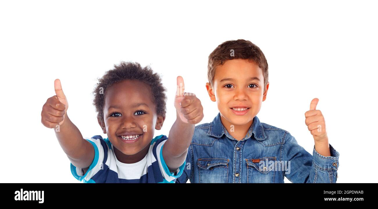 Happy classmates saying Ok with their thumbs up isolated on a white ...