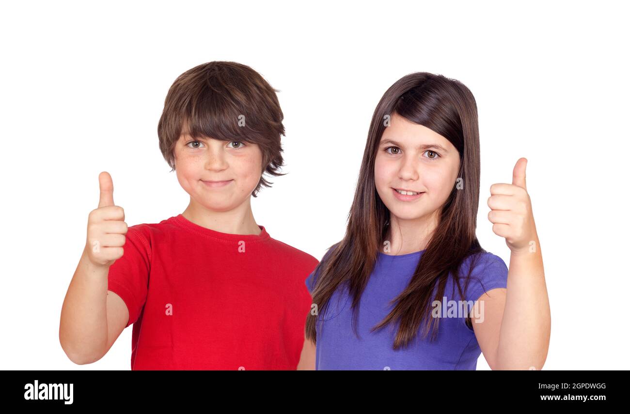 Children saying Ok with the thumb up isolated on a white background ...