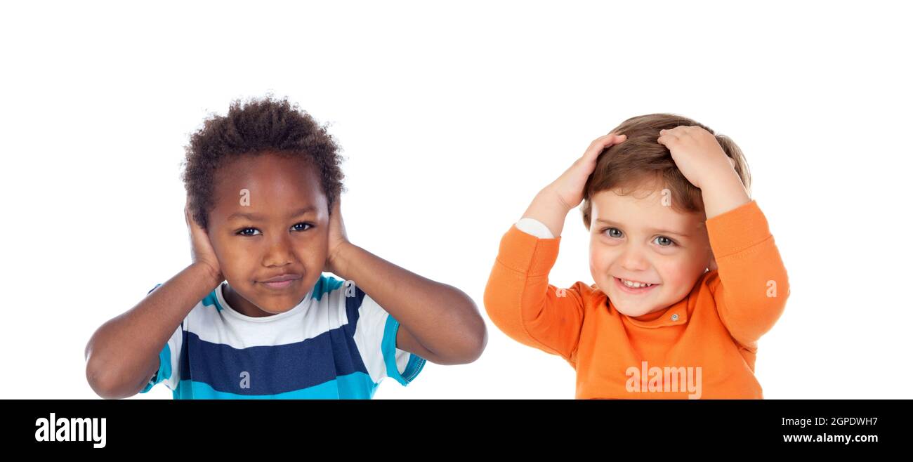 Children covering the ears and shocked by a loud sound isolated on a ...