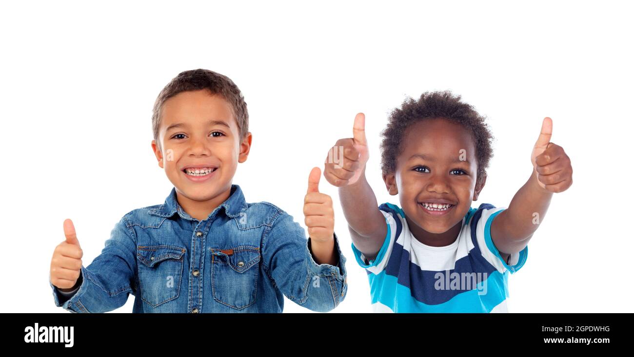 Children saying Ok with the thumb up isolated on a white background ...