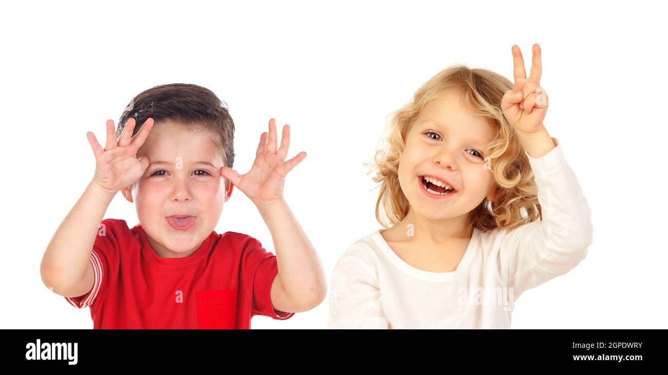 Couple of children doing jokes isolated on a white background Stock ...