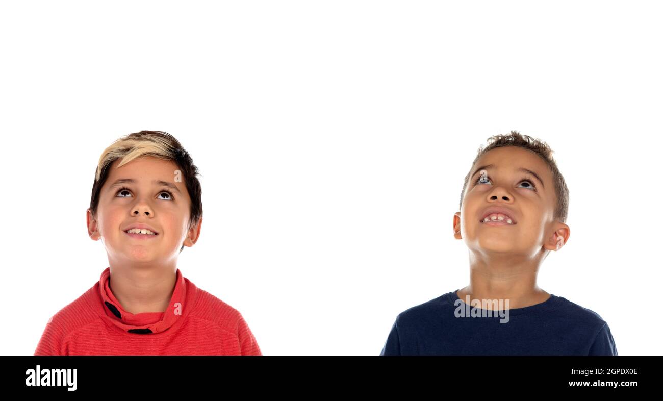 Two happy children looking up isolated on a white backround Stock Photo ...