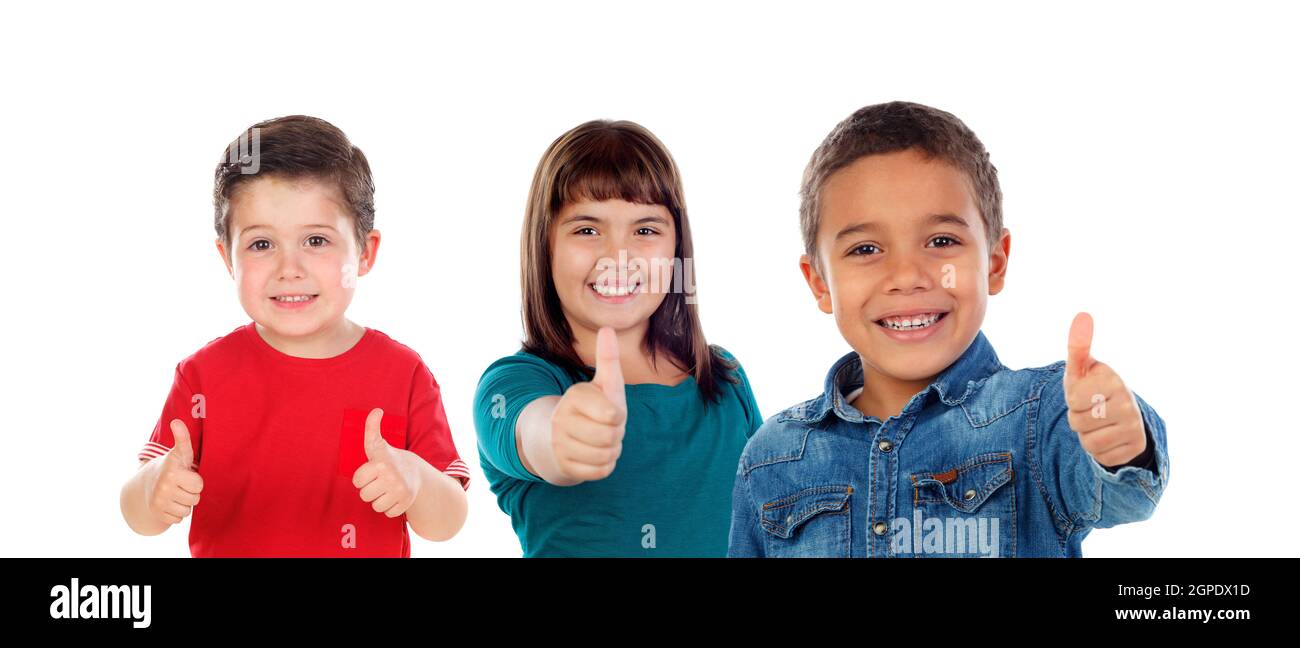 Happy children saying Ok with the thumb up isolated on a white ...