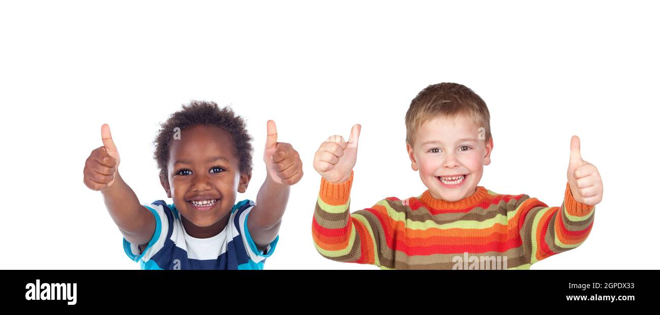 Happy classmates saying Ok with their thumbs up isolated on a white ...