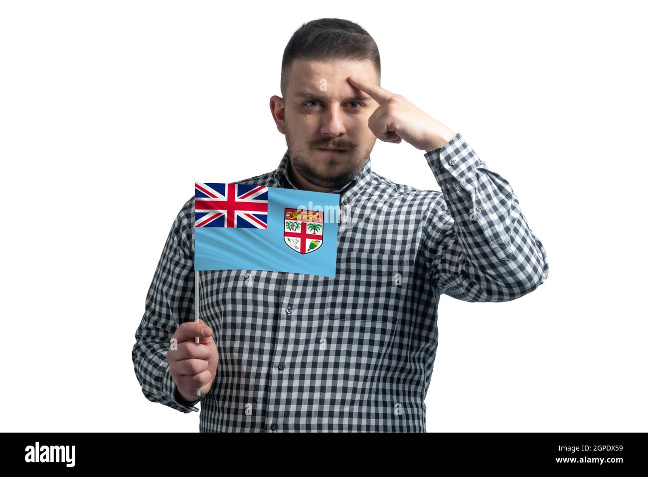 White guy holding a flag of Fiji and a finger touches the temple on the ...