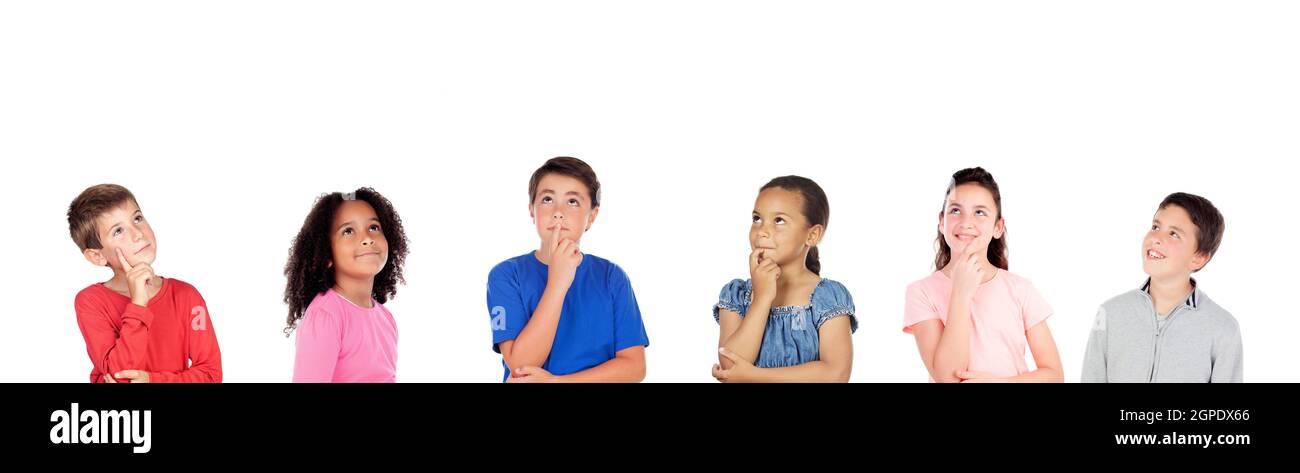 Pensive children thinking about something isolated on a white ...