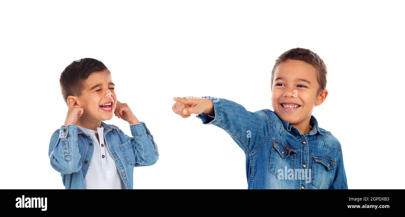 Two latin children isolated on a white background Stock Photo - Alamy