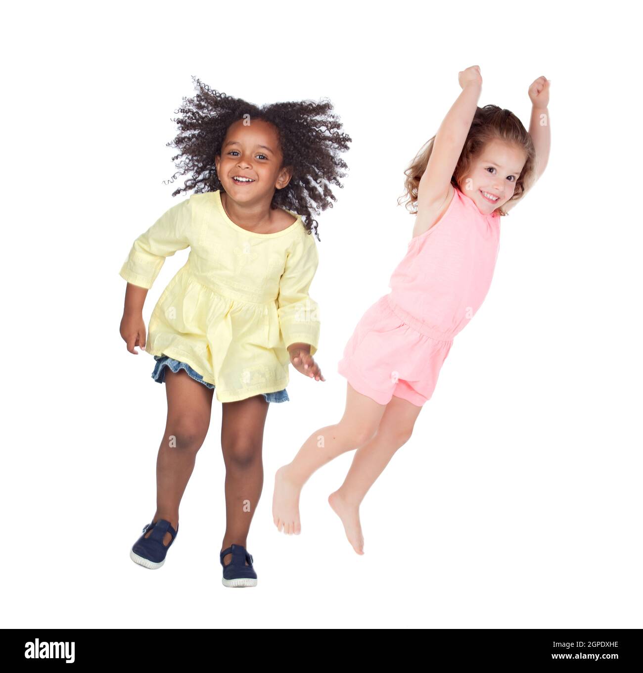 Two children jumping isolated on a white background Stock Photo - Alamy
