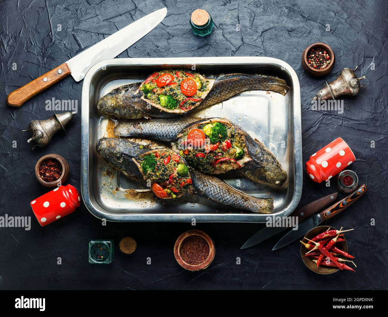 Roasted fish stuffed with broccoli and quinoa.Baked fish with ...