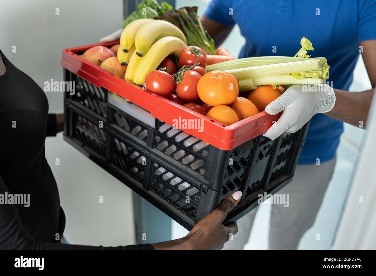 Online Order Food Delivery. African Man With Grocery Crate Stock Photo ...
