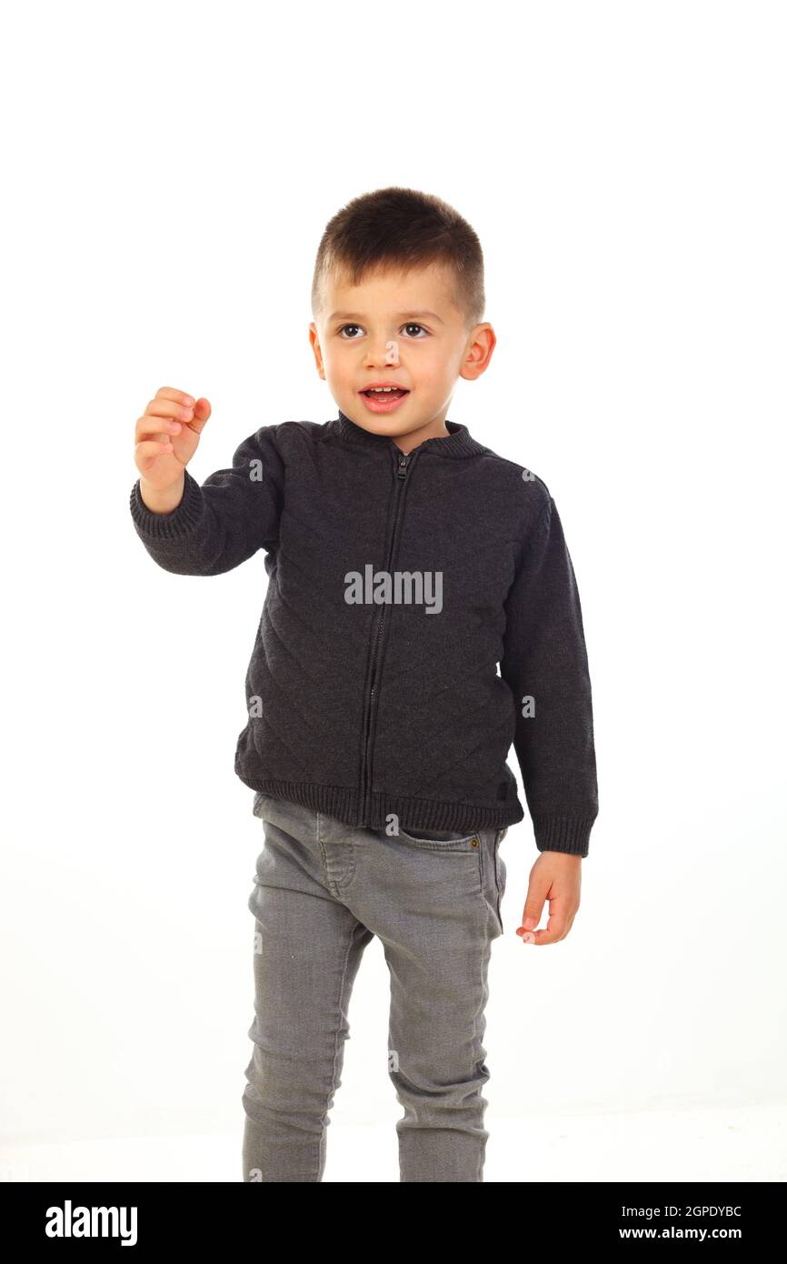 Beautiful child counting with his fingers isolated on a white ...
