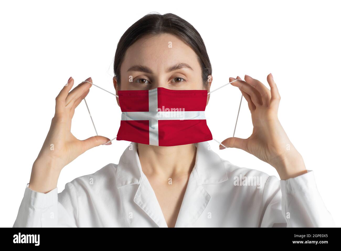 Respirator with flag of Denmark Doctor puts on medical face mask ...