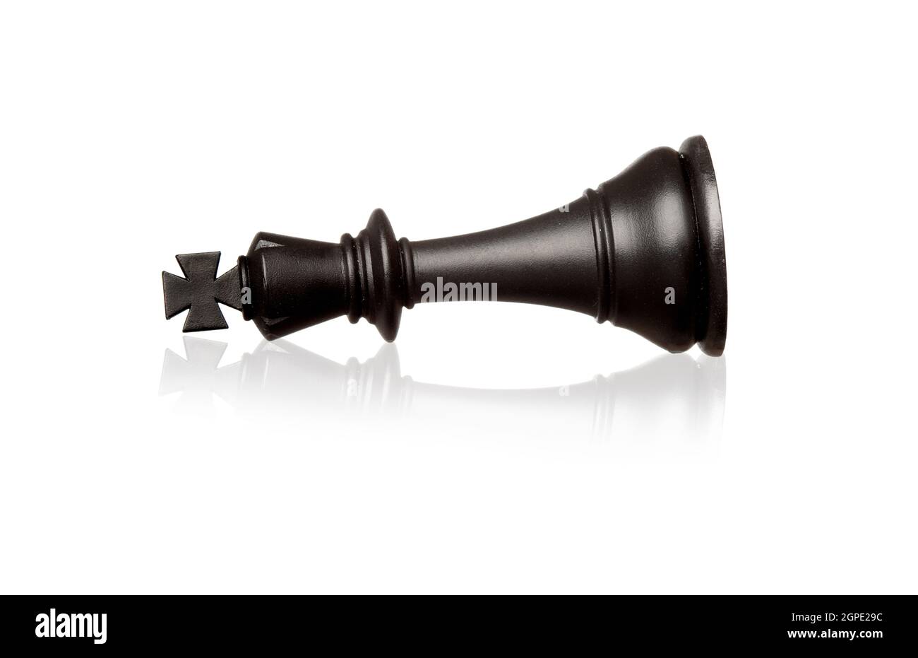 Chess piece king falling isolated on a white background Stock Photo - Alamy