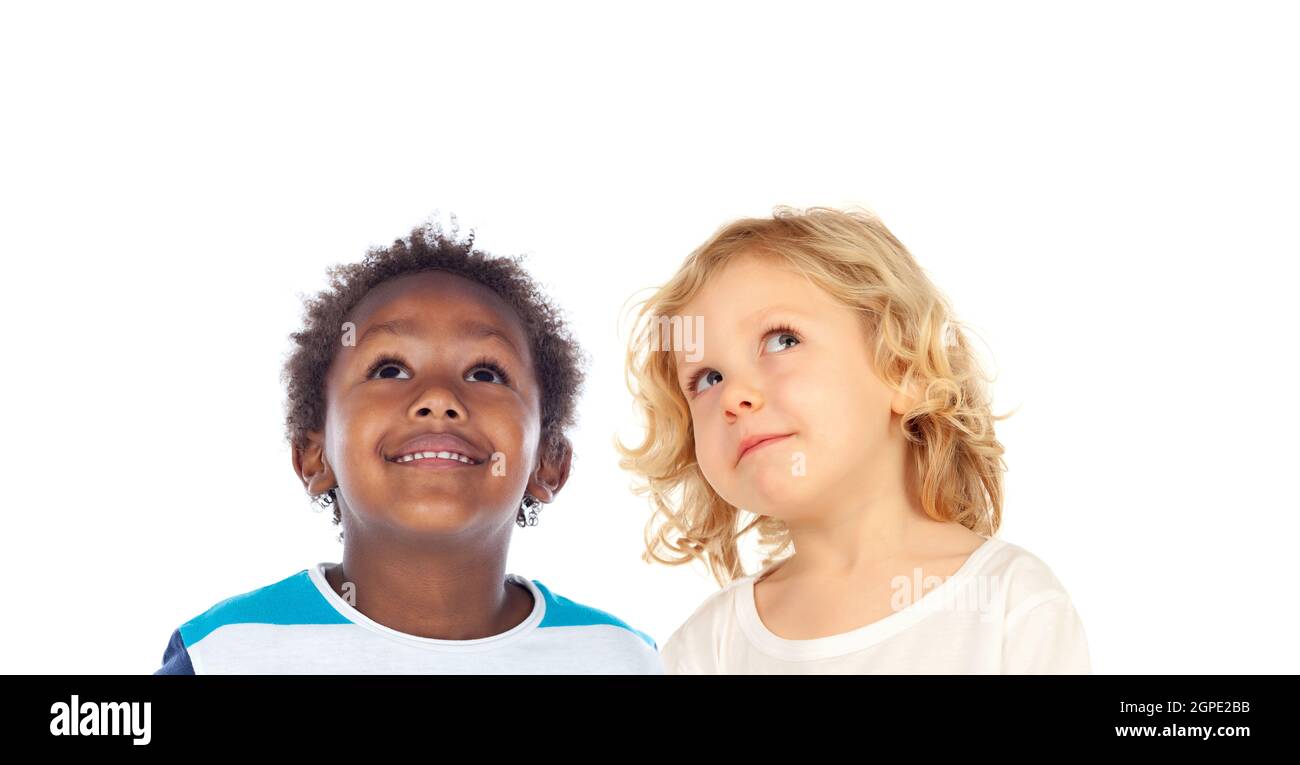 Two funny children looking up isolated on a white background Stock ...