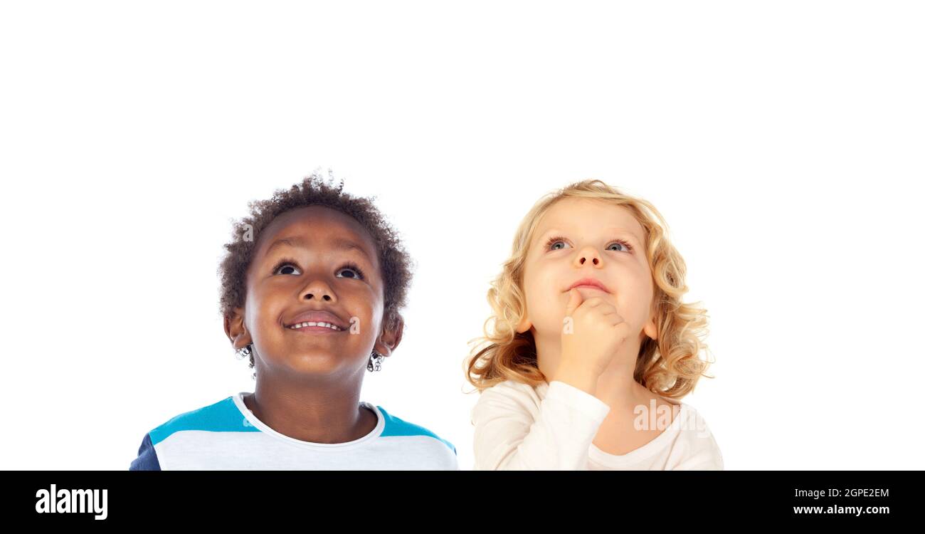 Two funny children looking up isolated on a white background Stock ...