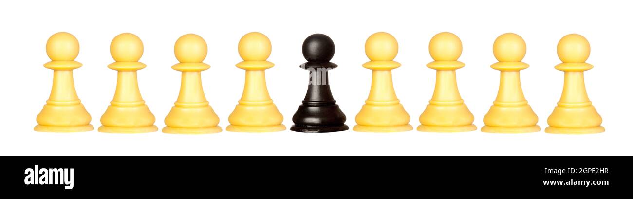Many pawns yellow and other one black isolated on a white background ...