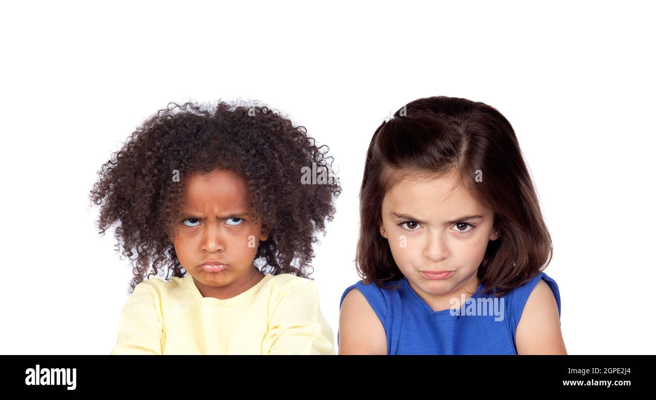 Two angry classmates isolated on a white background Stock Photo - Alamy