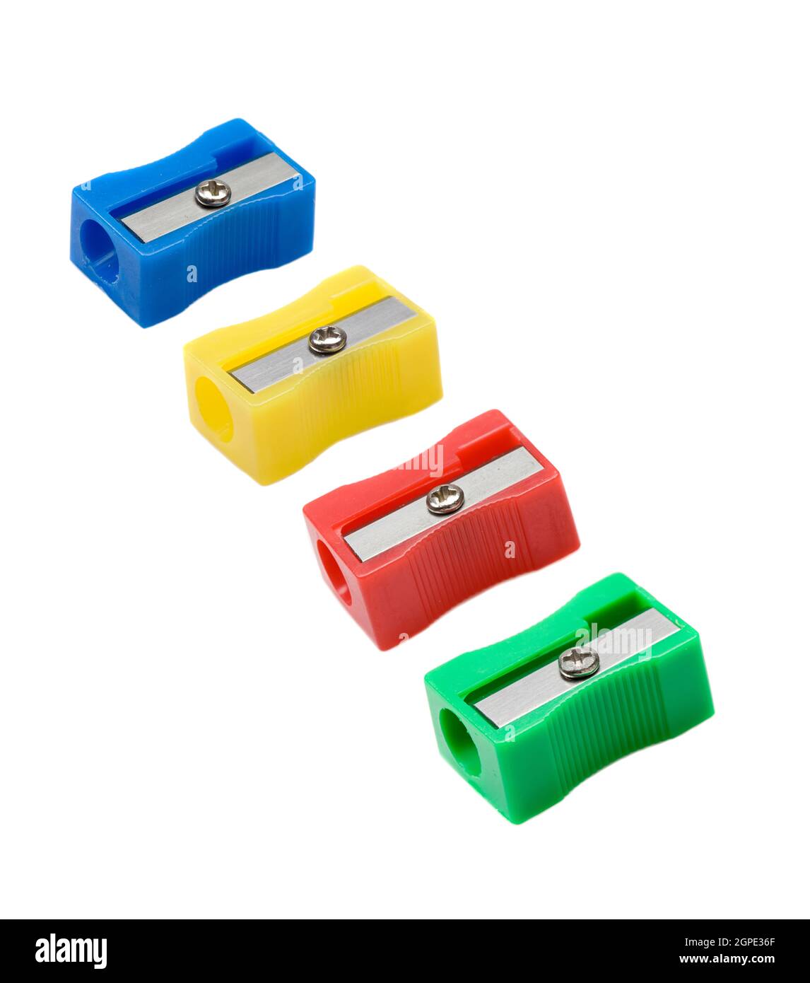 Four pencil sharpener with differents colors isolated on a white ...