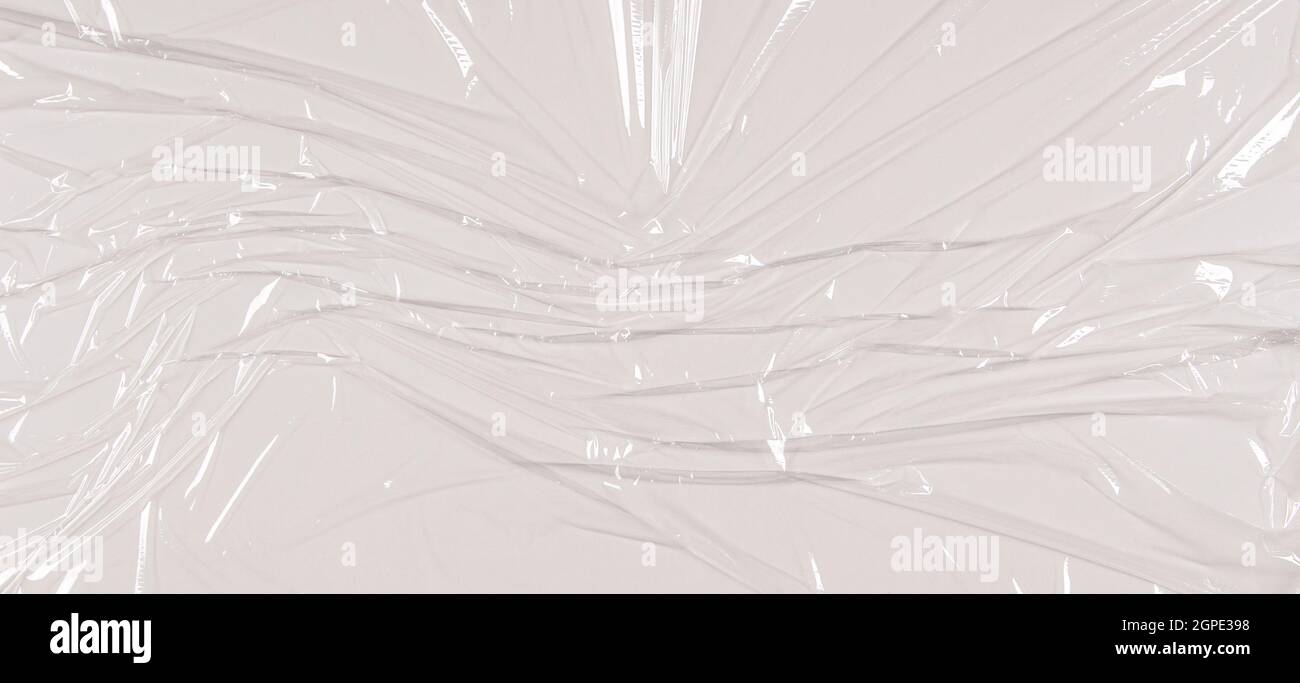 Transparent film cellophane background. White wrinkled stretched ...
