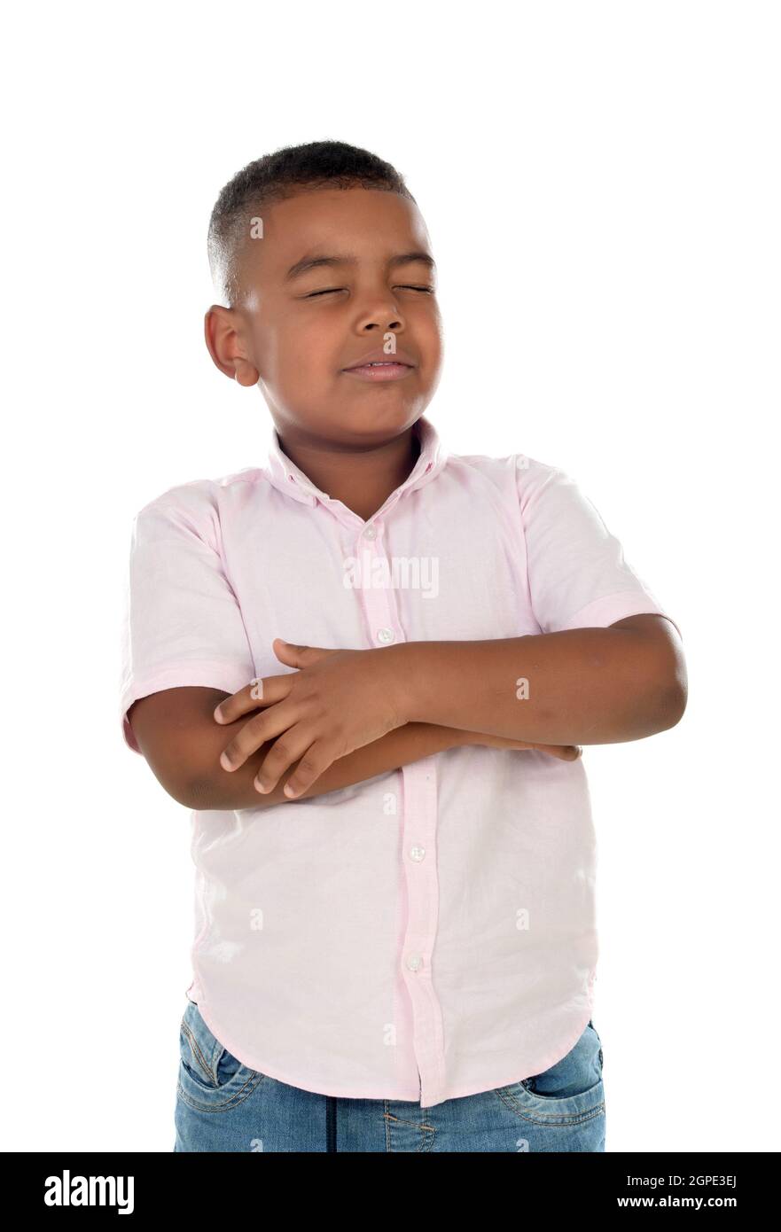 Latin child with his eyes closed imagining something isolated on a ...