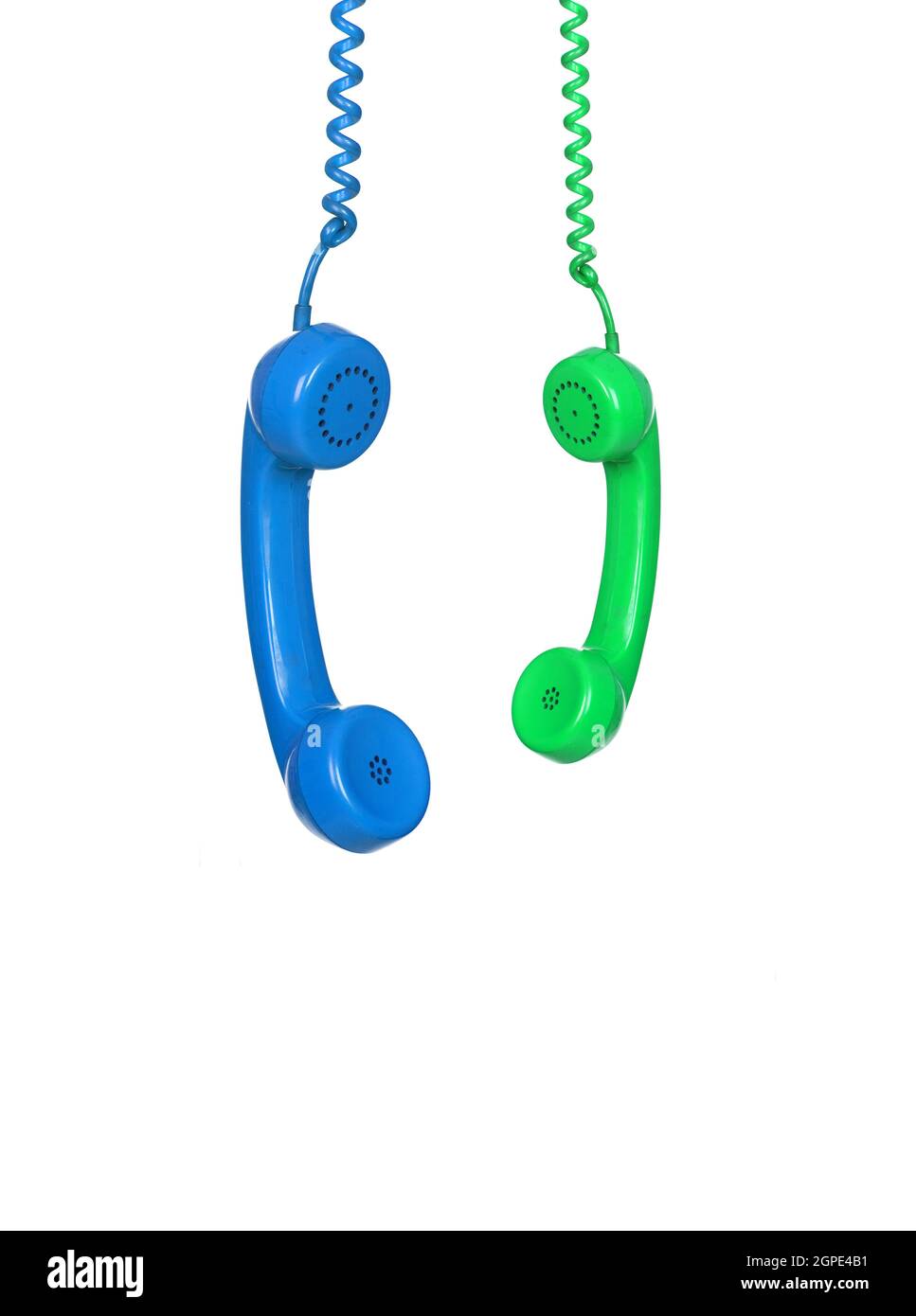 Blue and green phones hanging from a cable isolated on a white ...