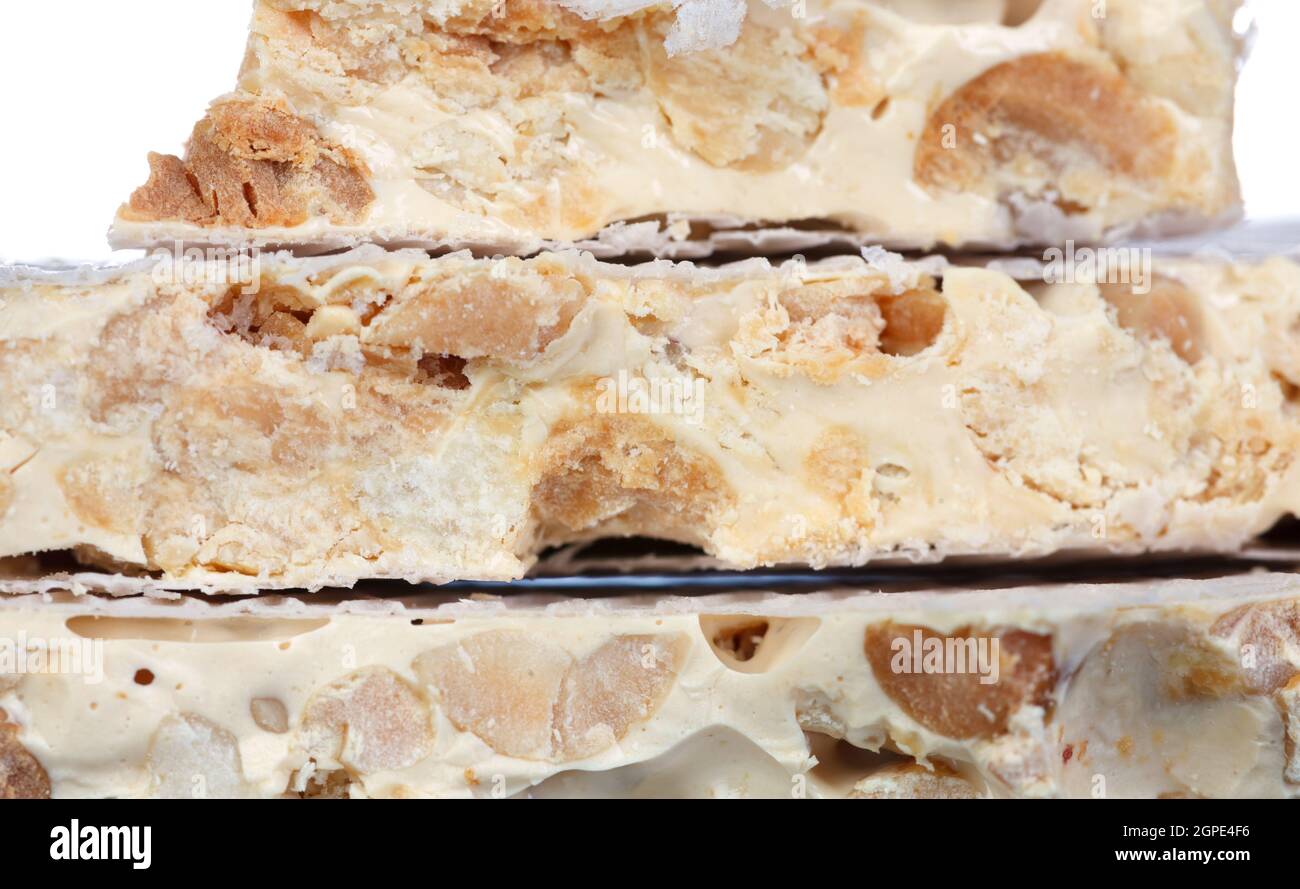 Delicious nougat typical sweet Christmas isolated on a white background ...