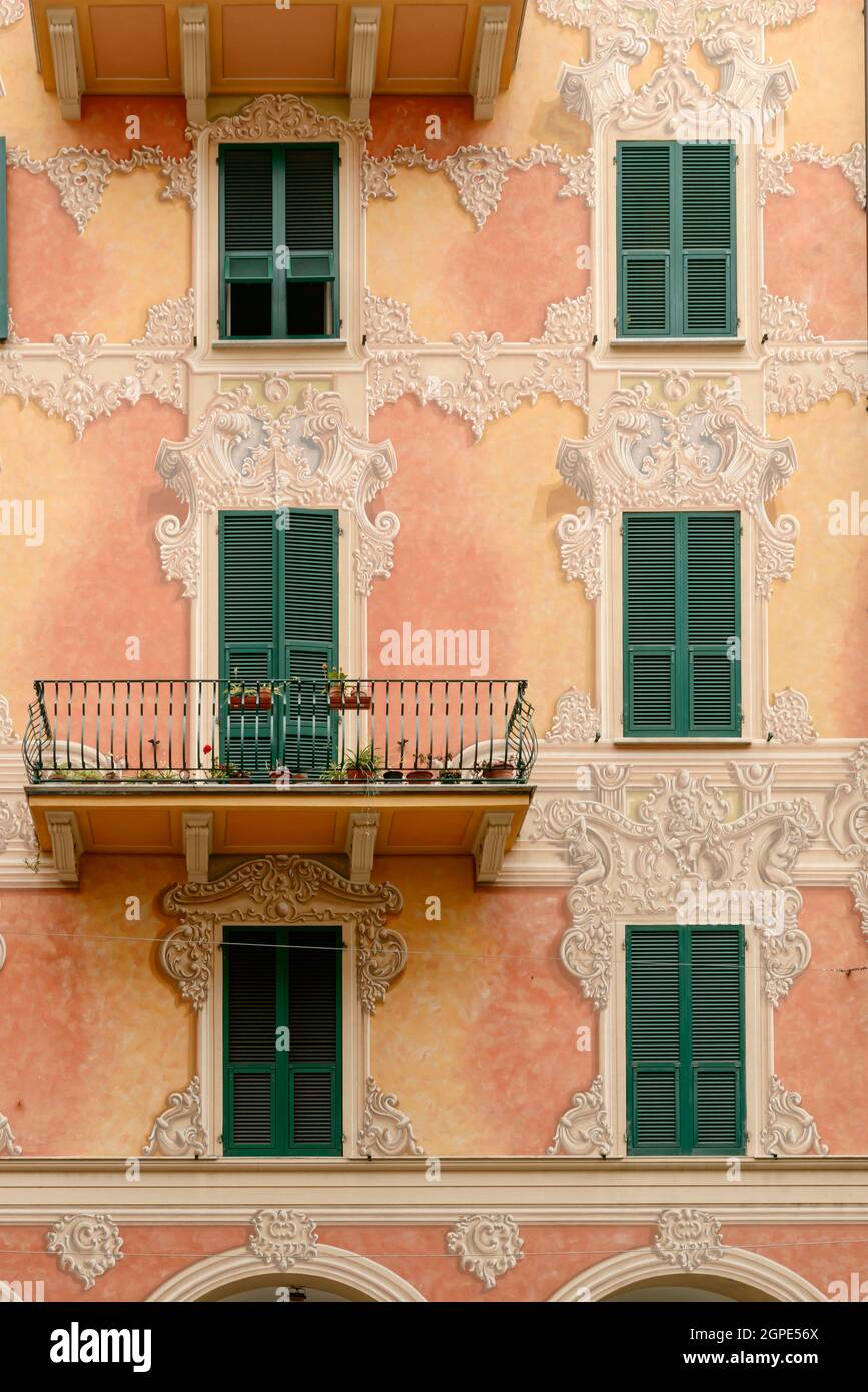 traditional painted facade of old building, shot at Mediterranean ...
