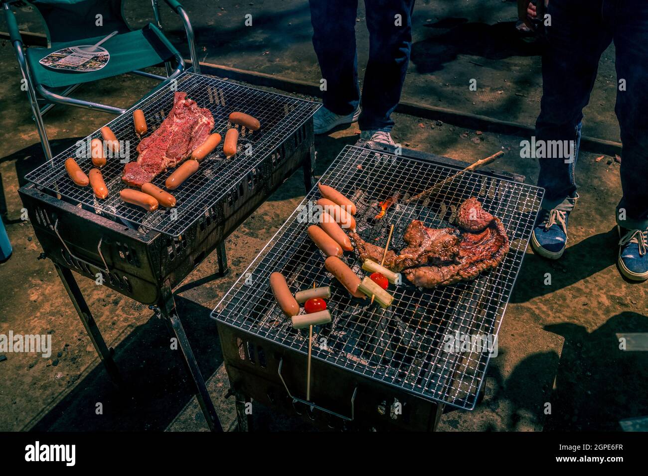 Charcoal-grilled meat image at barbecue. Shooting Location: Tokyo ...