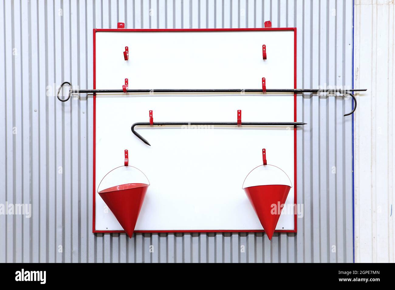 Items for ensuring fire safety in the workplace. Fire-fighting stand at ...