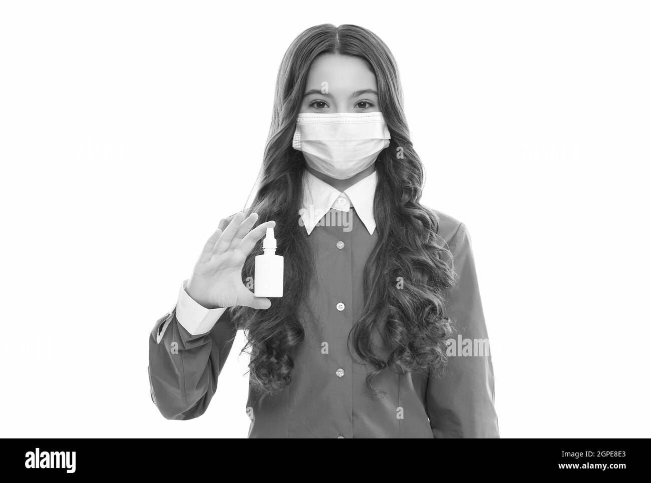 kid in respirator mask with nasal drop or spray for treatment of runny ...