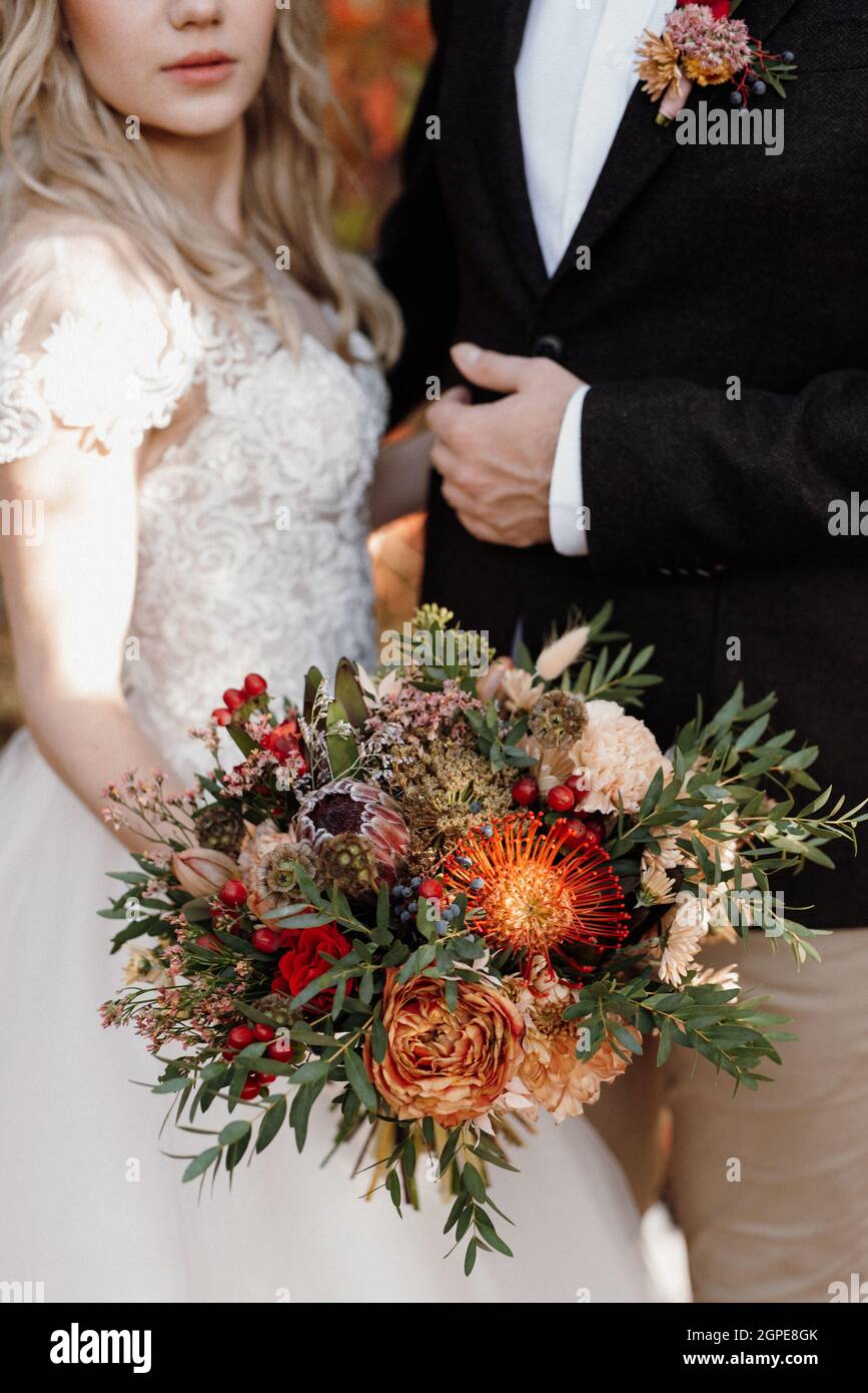 bridal bouquet in red autumn shades of Kenyan dried flowers Stock Photo ...
