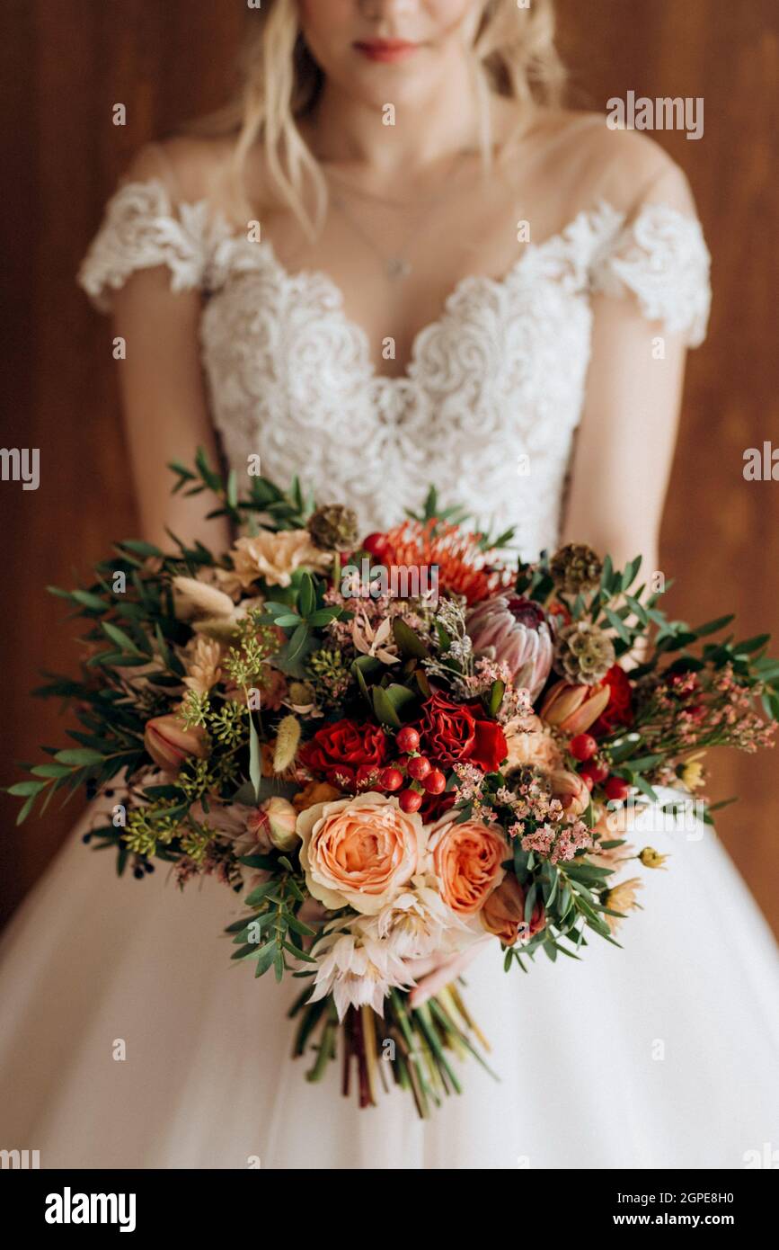 bridal bouquet in red autumn shades of Kenyan dried flowers Stock Photo ...