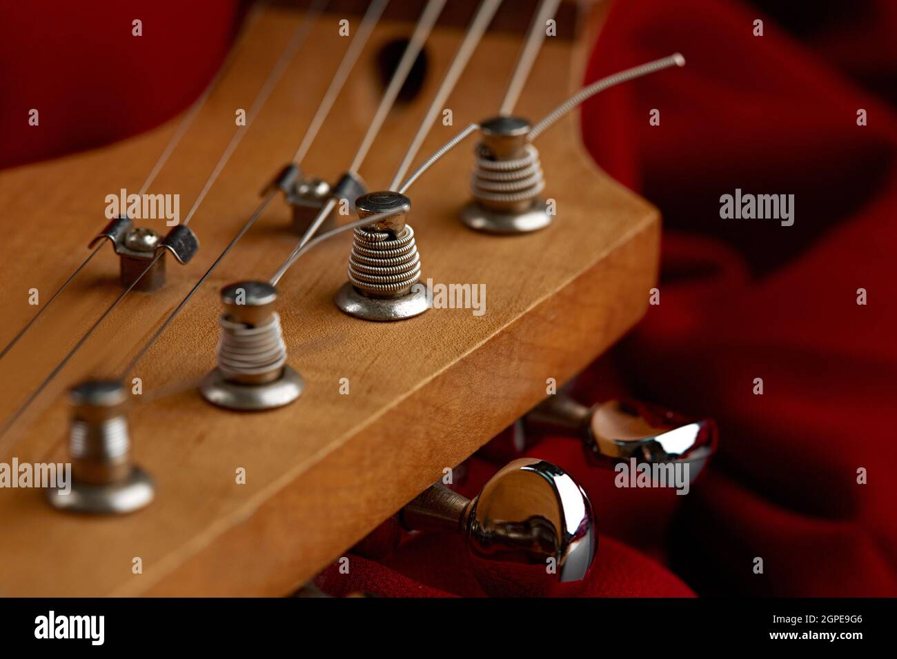 Electric guitar head closeup, nobody. String musical instrument ...